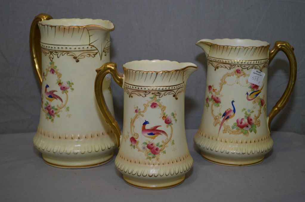 Three graduating sized pheasant motif English Whieldon ware handpainted ...