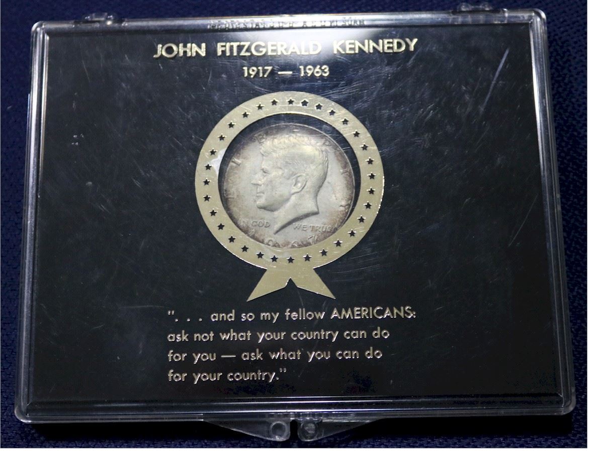 1917-1963 John F. Kennedy commemorative with Half Dollar in Display Case.
