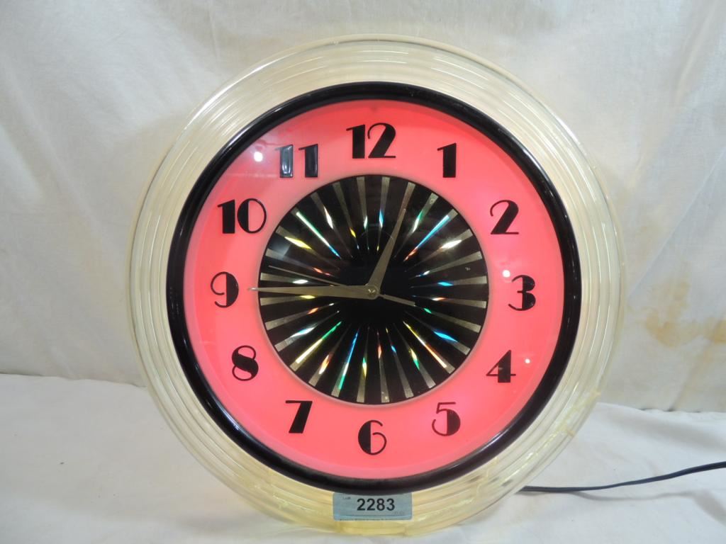 RETRO PSYCHEDELIC LIGHT UP MOVING CLOCK