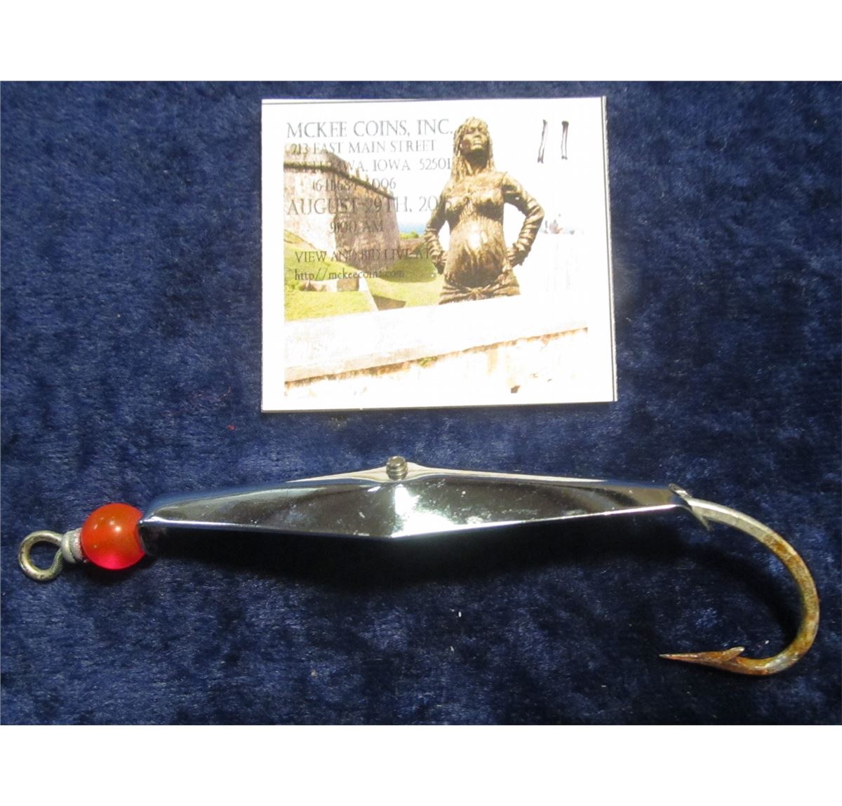 11. "James E. Clark Spoon Squid" Sinker with red floating ball.