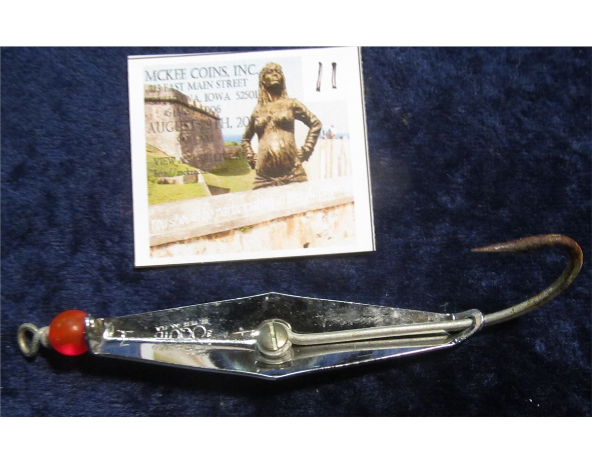 11. "James E. Clark Spoon Squid" Sinker with red floating ball.