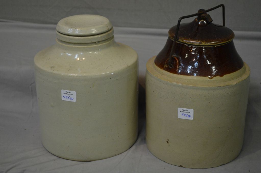 Two stoneware pickle crocks with removable lids