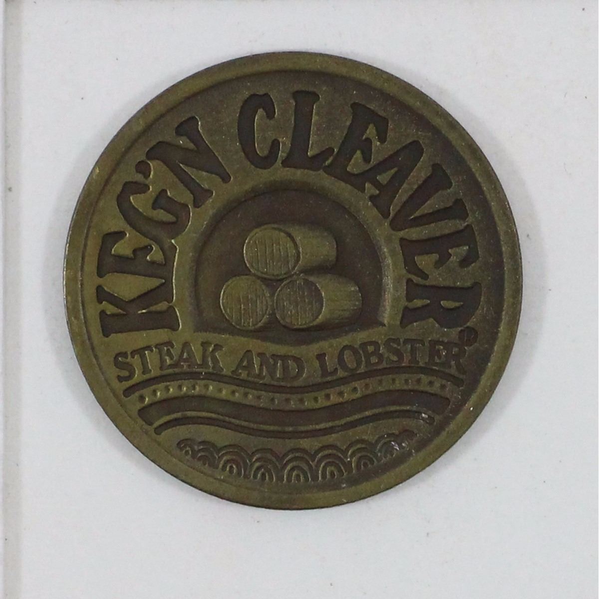 The keg's Cleaver one Dollar Token. Diameter 37.5mm