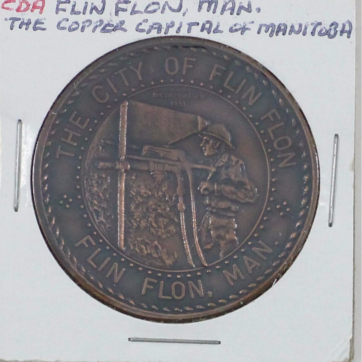 The Copper Capital of Manitoba, Flin Flon man Souvenir coin. Diameter 39mm