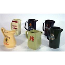 Six pub water jugs including Bells Whisky, Mackinlay Whisky, Seagrams ...