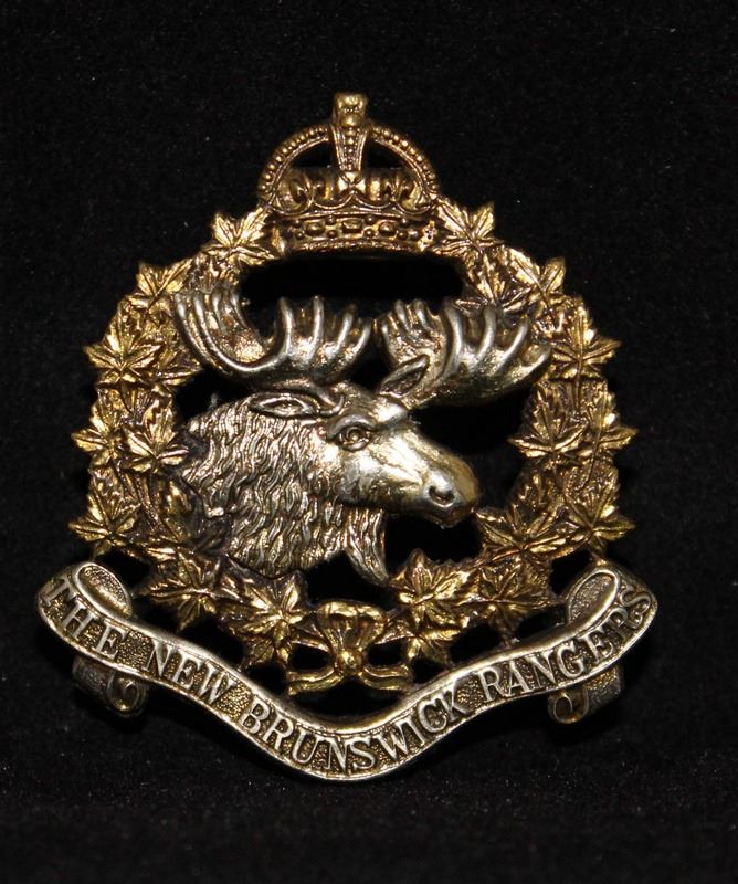 D296. New Brunswick Rangers Cap Badge