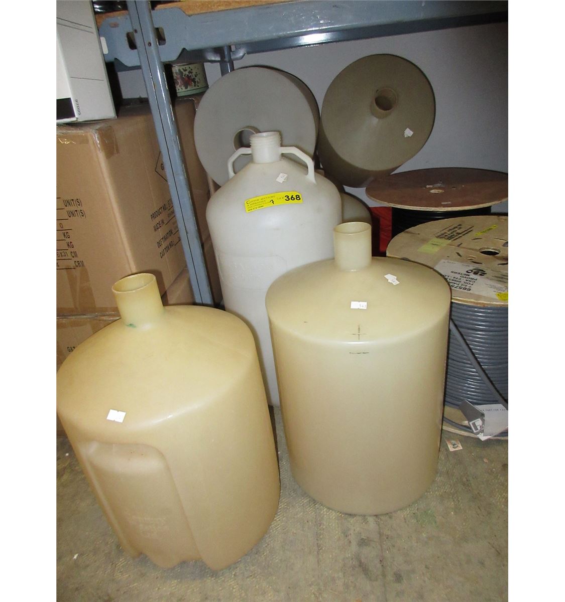 7 Empty plastic beer making containers