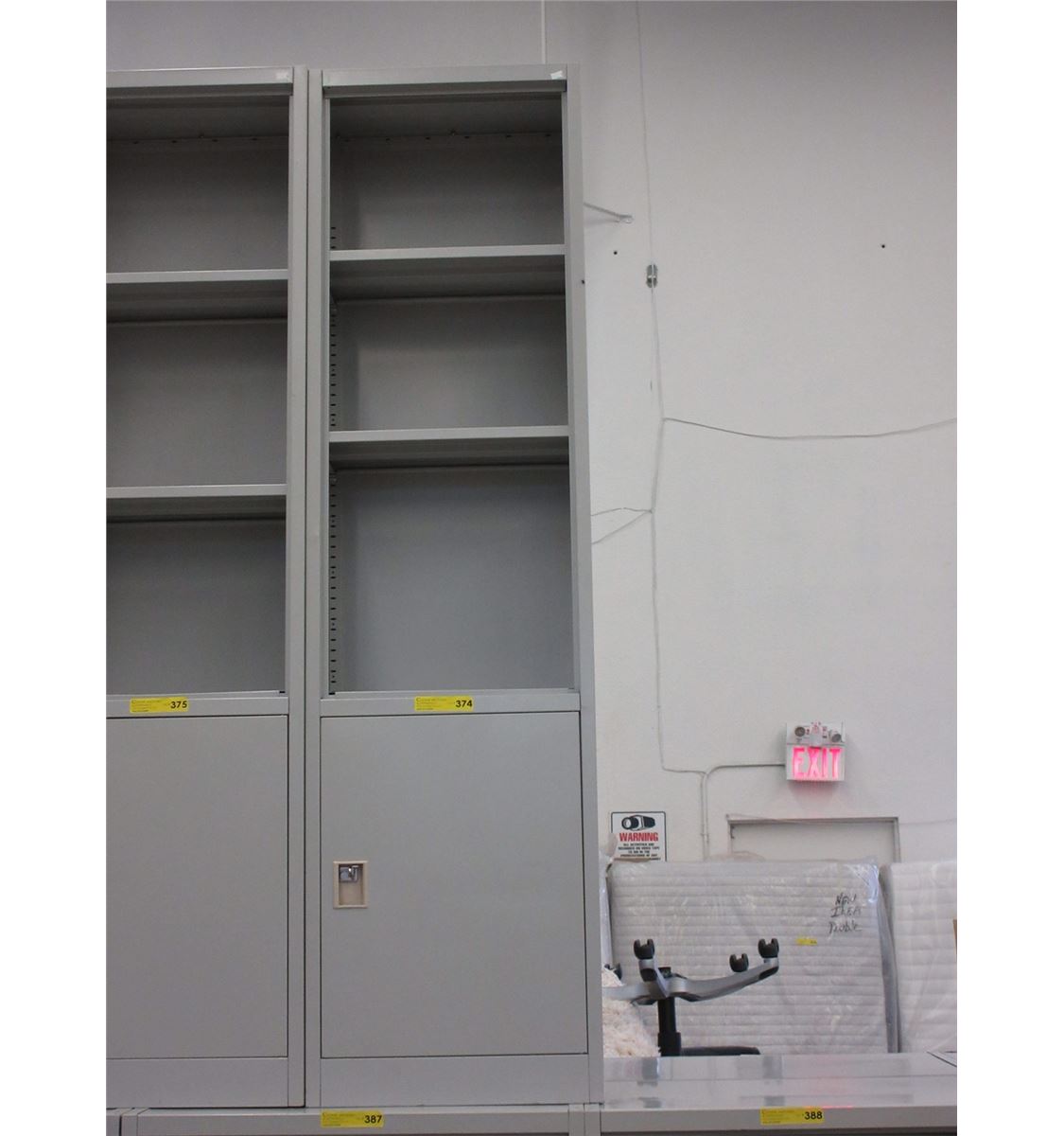12" Deep - Metal storage cabinet/shelf - used