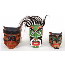 Three Kwagiulth Masks; Bukwus by Rupert Scow 6" H. 3 1/2" W., Bear Mask ...