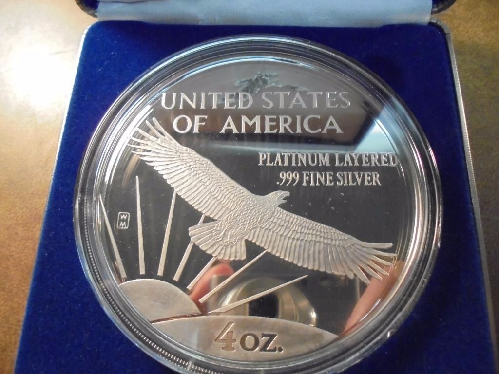 1997 1/4 POUND (4 OZ.) .999 FINE SILVER PLATINUM LAYERED ROUND. IN CASE