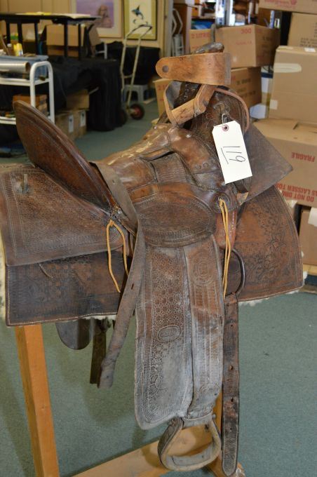 Antique Western Saddle w/hi back, needs restoration, c/w wood stand