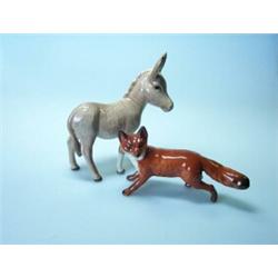 A Beswick pottery donkey and a fox, Beswick England marks, 11cm and 6 ...
