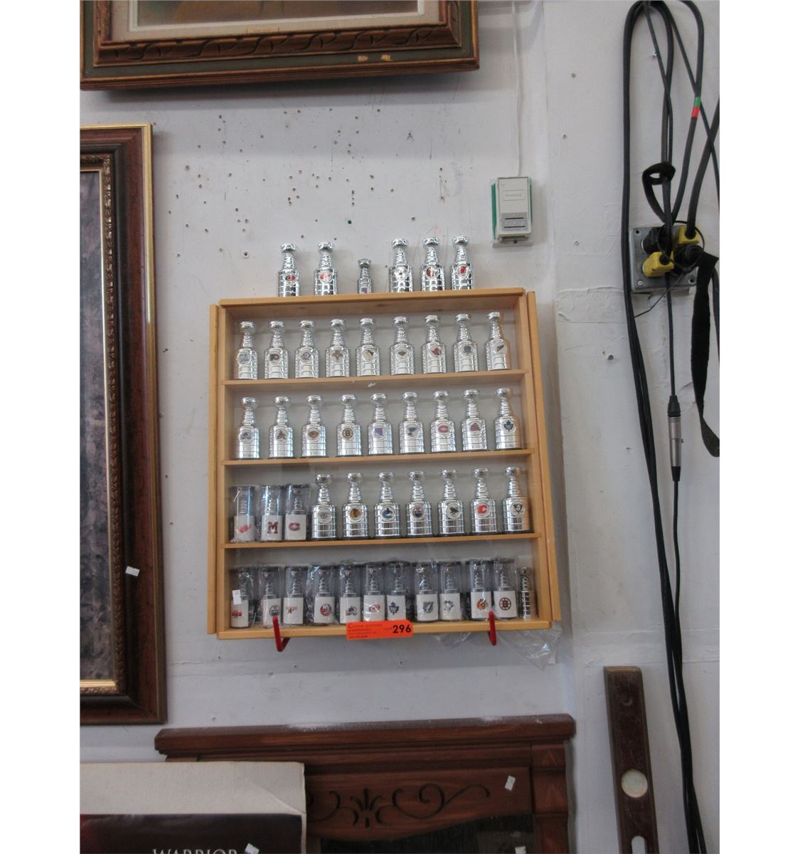 Mini Stanley Cups in display case