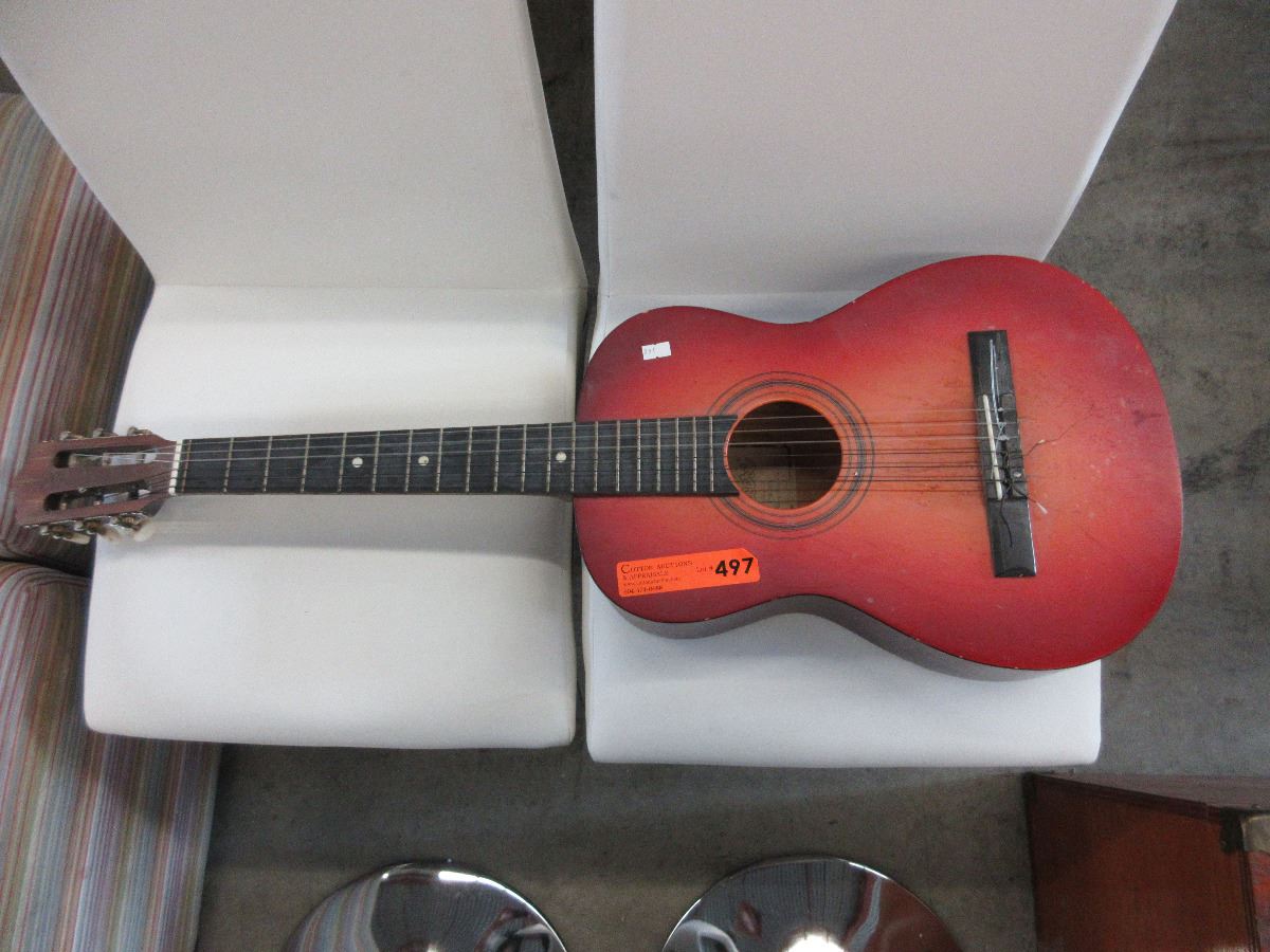 Used "Encore" acoustic guitar