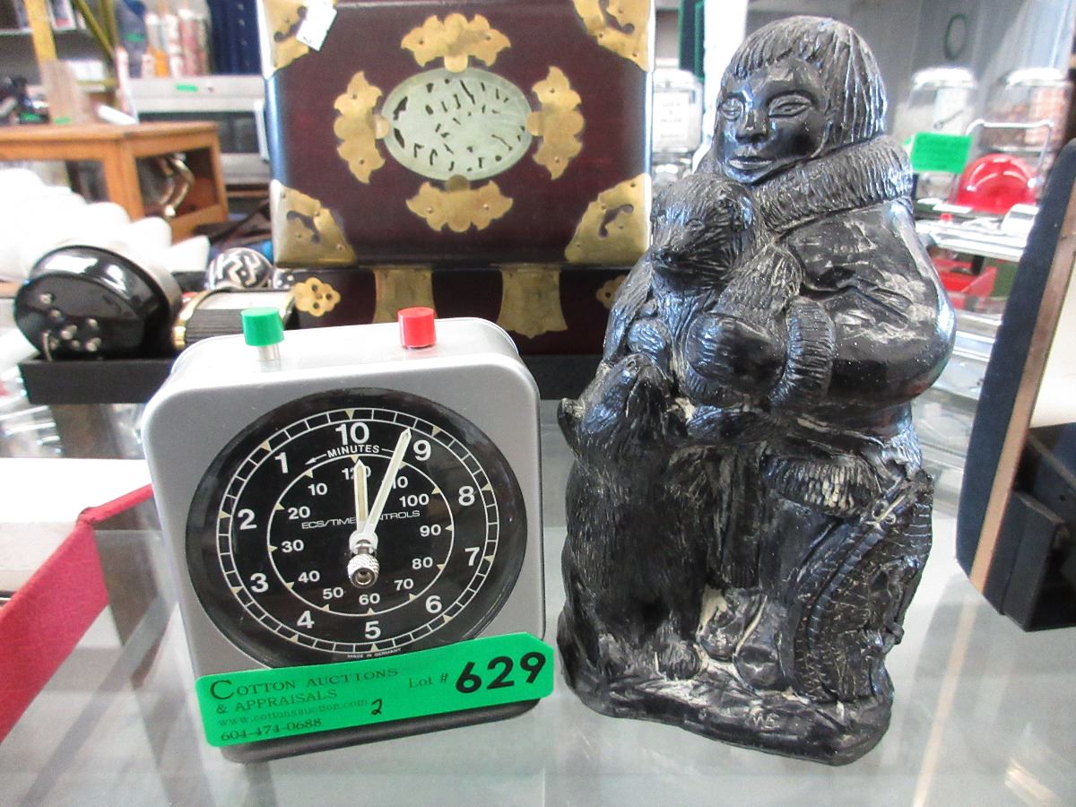 Wolf sculpture & timing clock