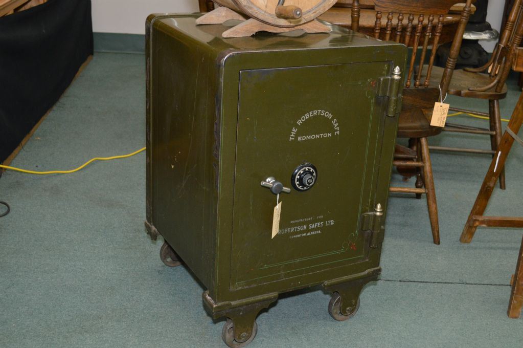 Antique double door combination safe on four wheels, appear to be ...