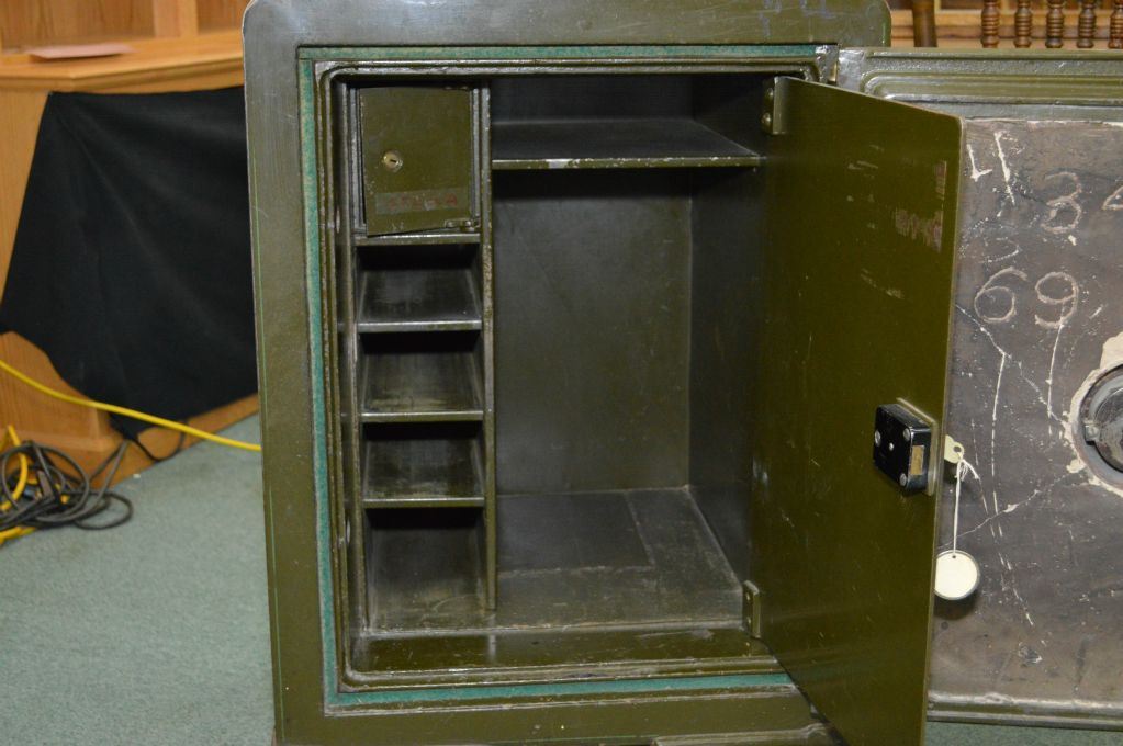 Antique double door combination safe on four wheels, appear to be ...