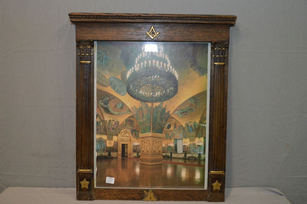 Vintage wooden picture frame decorated with Free Mason symbols