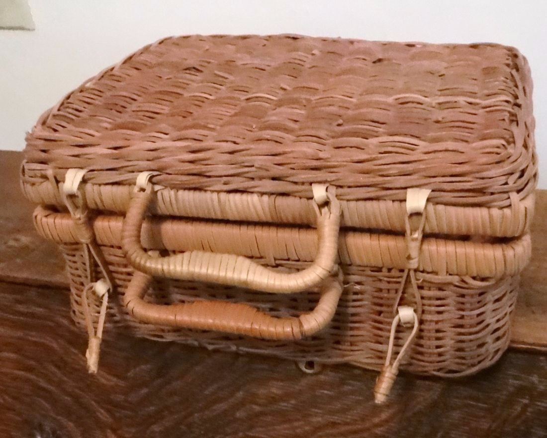Child’s tea set in wicker carrying case