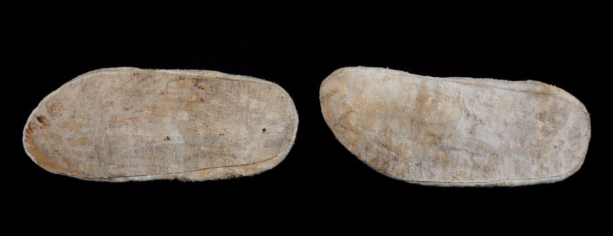 Pair of Sinew Sewn Buffalo Hide Moccasins with Geometric Design ...