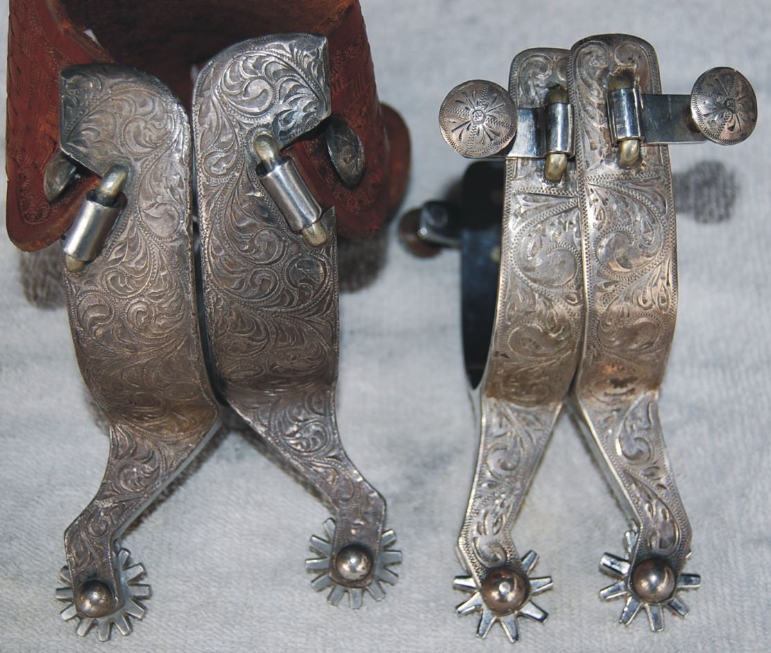 2 nice pairs of Fleming silver overlaid spurs