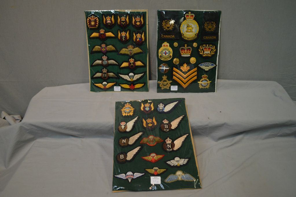 A large selection of vintage RCAF patches and buttons