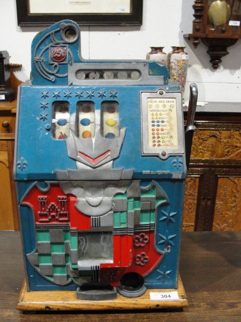 Antique cast iron one armed bandit (slot machine) working