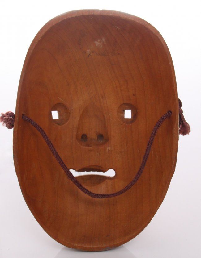 Antique Japanese wood carved Okame mask. Goddess Okame