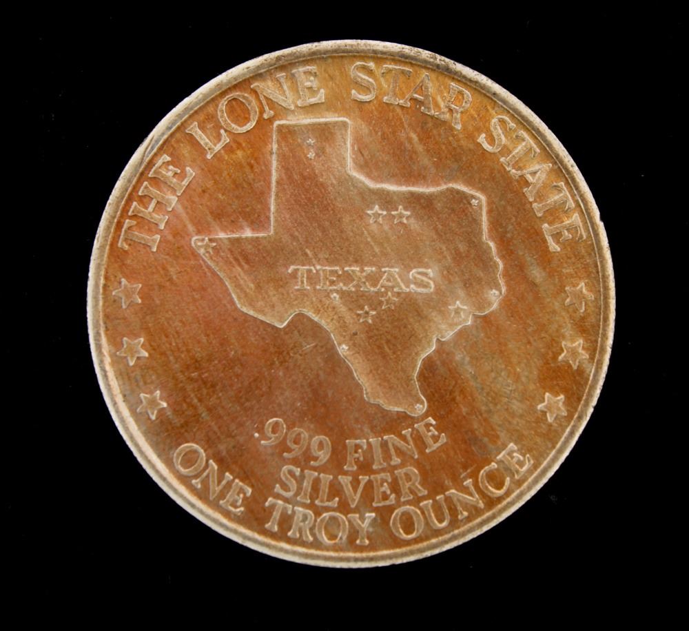 Precious Metals (1): Lone Star State 31 gm .999 silver disc; marked one ...