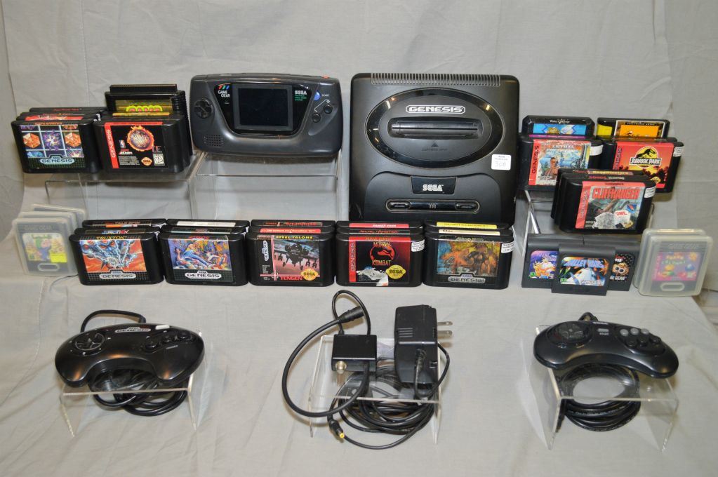 Vintage Sega Genesis video game including game console and hand held ...