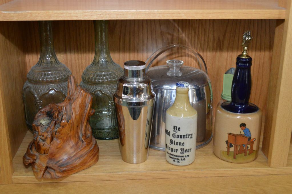 Shelf lot of vintage bar collectibles including seltzer bottles, ice ...
