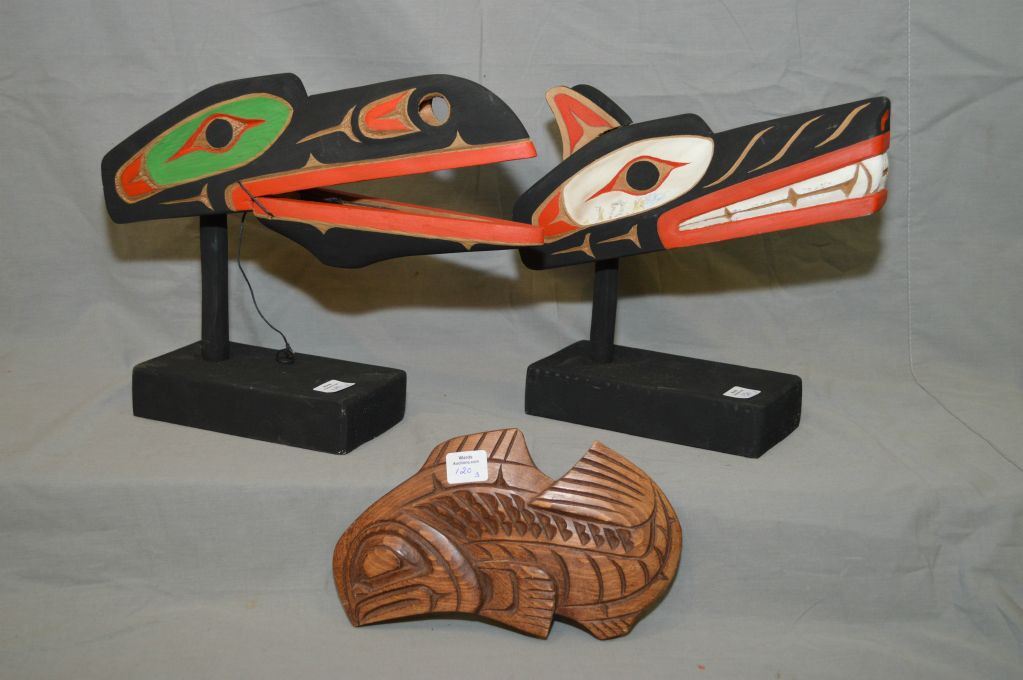 Two Haida masks on bases "Raven" and "Wolf" both signed Darcy Day and a ...