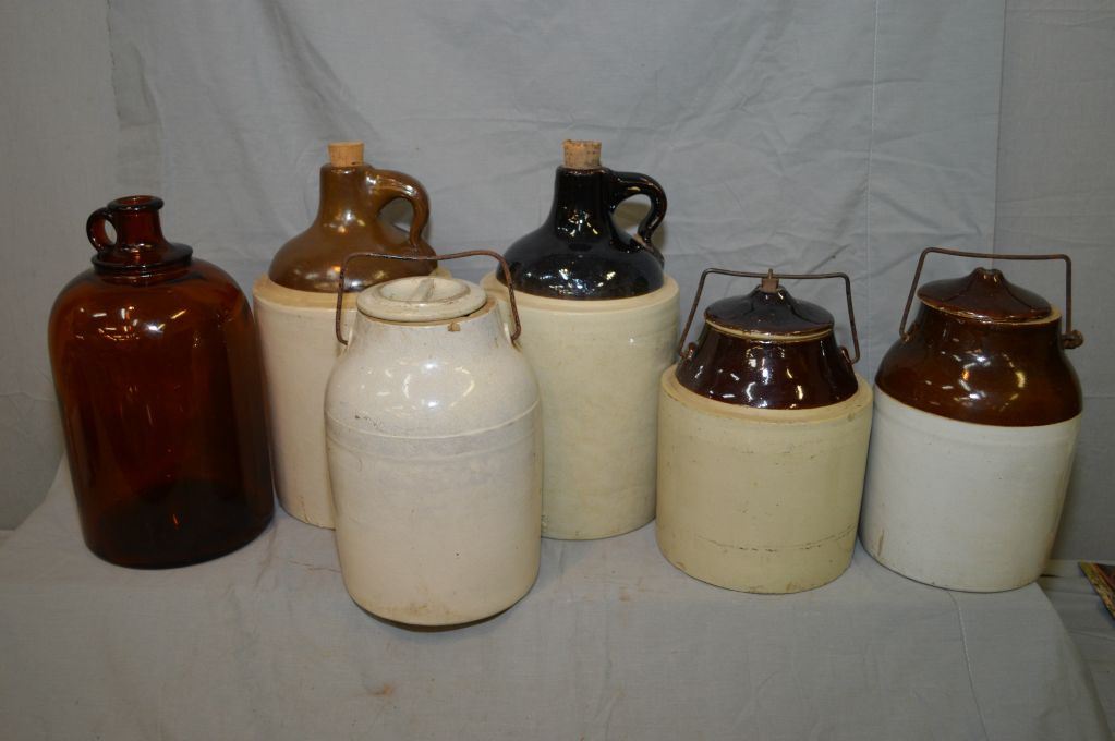 Three lidded stoneware pickle crocks, and three jugs, including two ...