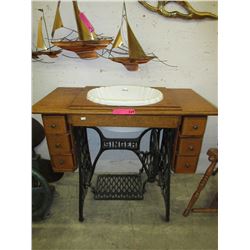 Wash basin in vintage sewing machine base