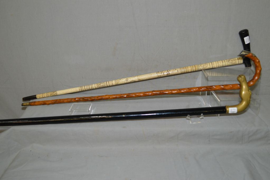 Three vintage canes including scrimshaw bone cane with Batak calendar ...