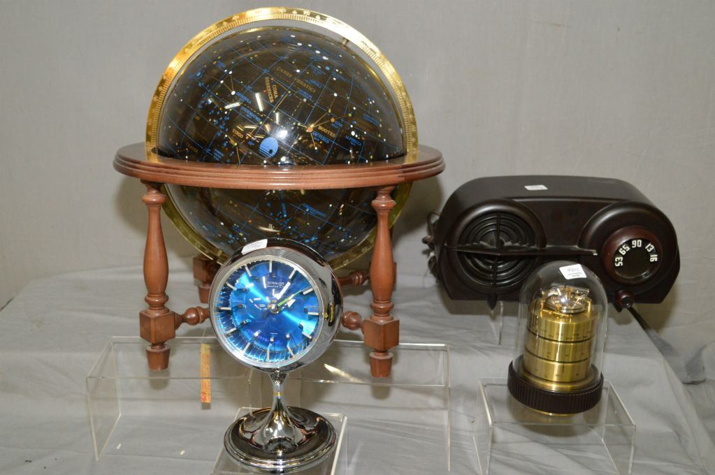 Selection of office collectibles including transparent constellation ...