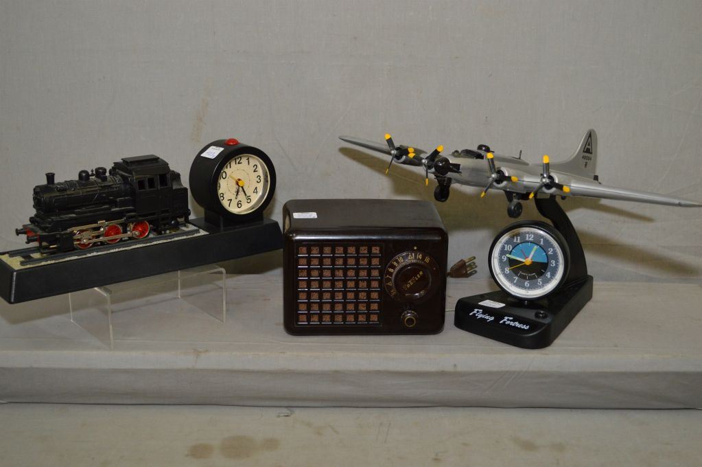 Battery operated steam engine motif mantle clock, a Flying Fortress ...