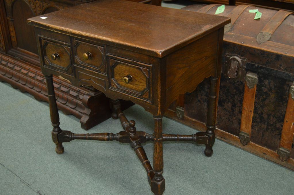 Small three drawer antique Tudor style side table