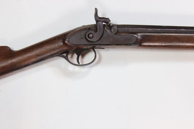 Antique half stock percussion rifle