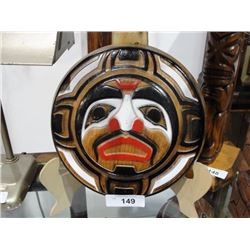 Carved native plaque