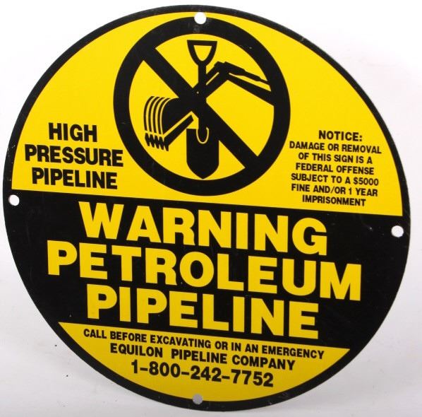 Equilon Pipeline Company Round Warning Sign