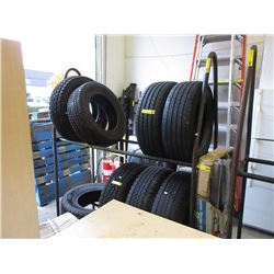 Rolling tire rack with 2 tires