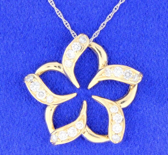 Diamond pinwheel flower pendant