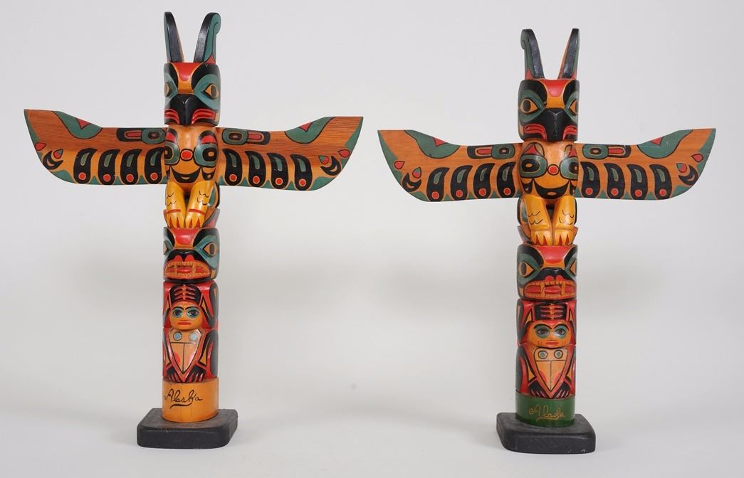 Pair of Tlingit Totems Carved with Thunderbird and Bear Holding Human ...