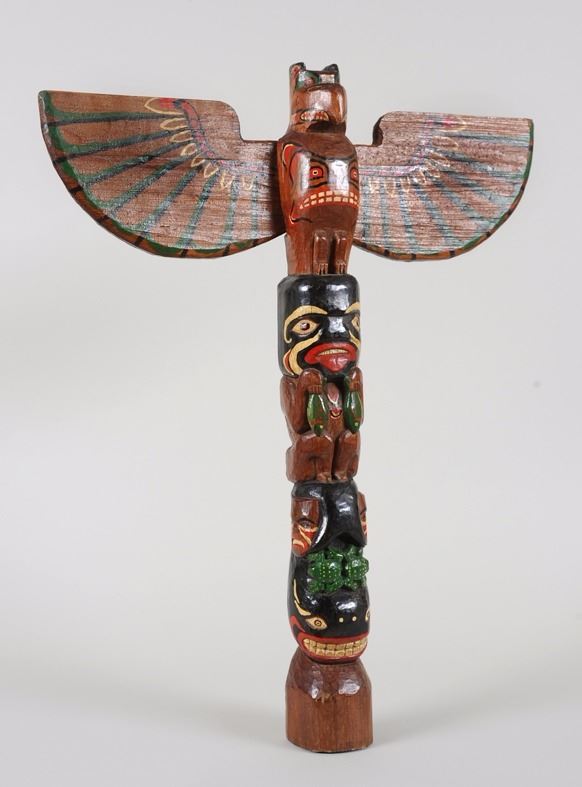 Northwest Coast Totem Carved with Thunderbird, Bear Holding Two Fish ...