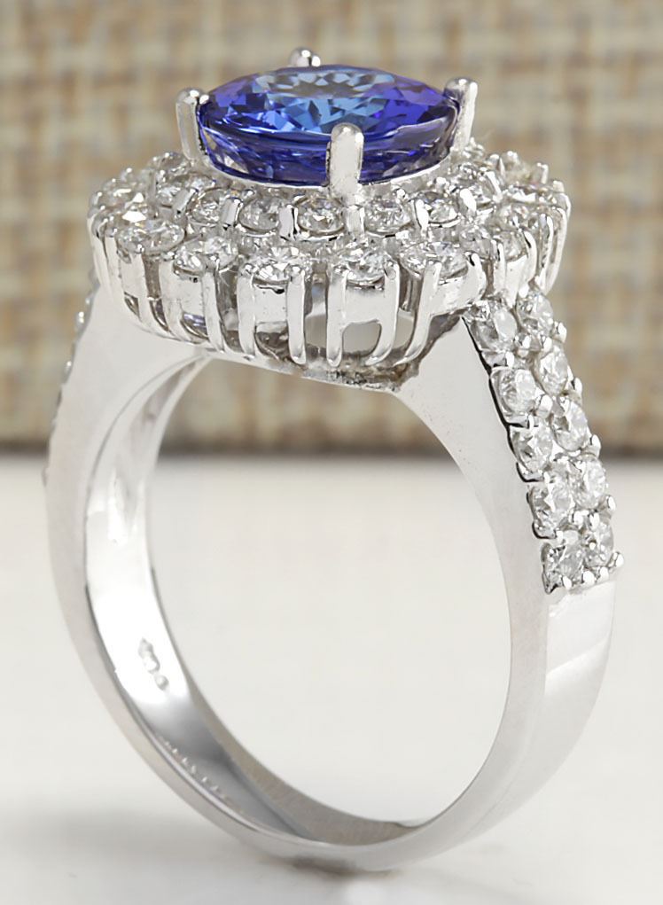 4.03CTW Natural Blue Tanzanite And Diamond Ring In 14K White Gold