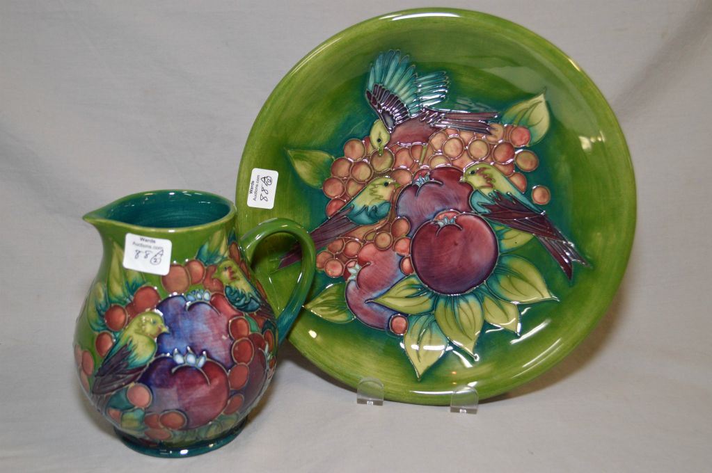 Two pieces of birds and fruit Moorcroft pottery including pitcher and ...