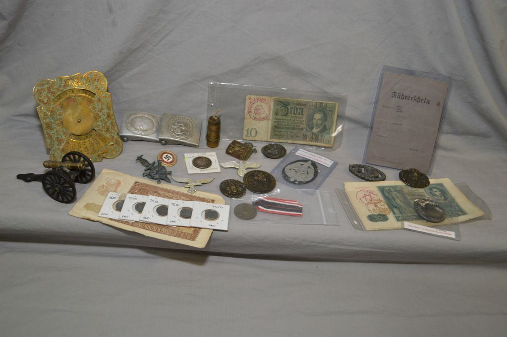 Selection of collectibles including a brass calendar, selection of Nazi ...
