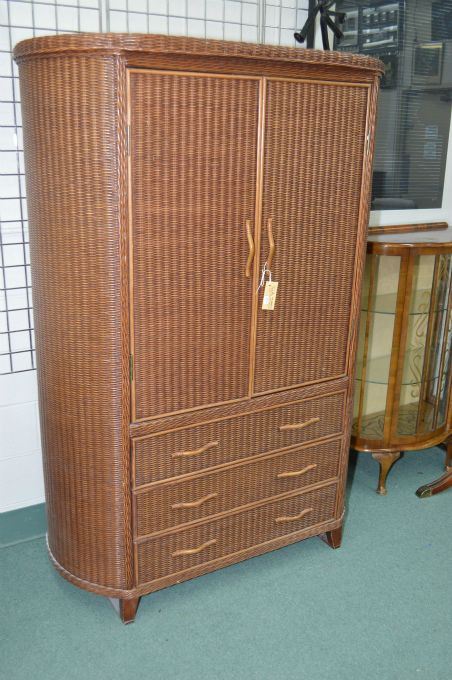 Modern woven wicker armoire with two doors and three drawers