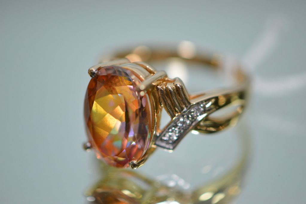 Lady's 14kt yellow gold, Azotic topaz and diamond ring set with 6.62ct ...